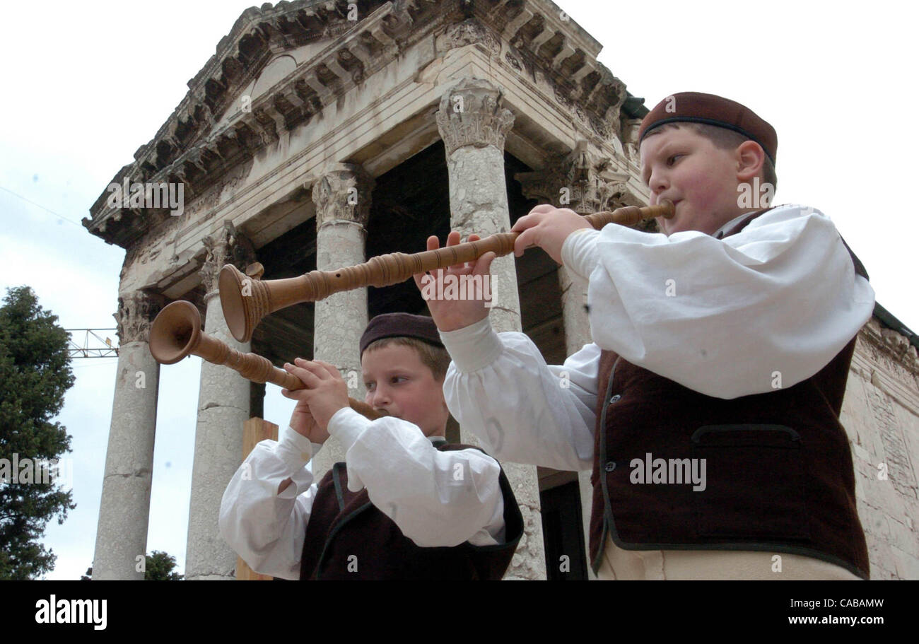 ©Andrija Ilic Pula, Croatia, June 2004 A boys dressed in a traditional ...