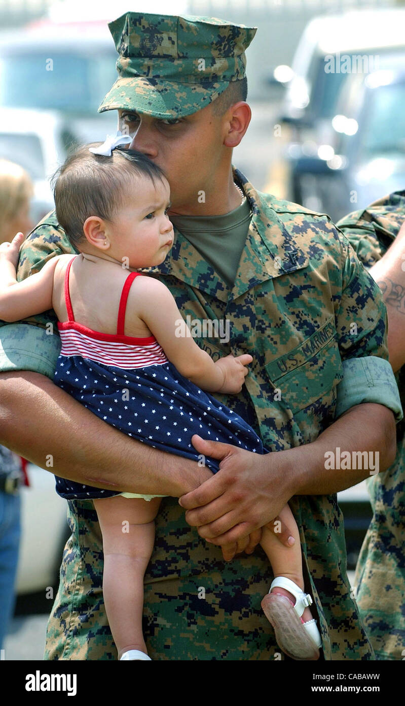 METRO LANCE CORPORAL JOSHUA SEGUNDO, from San Antonio, kisses his baby ...