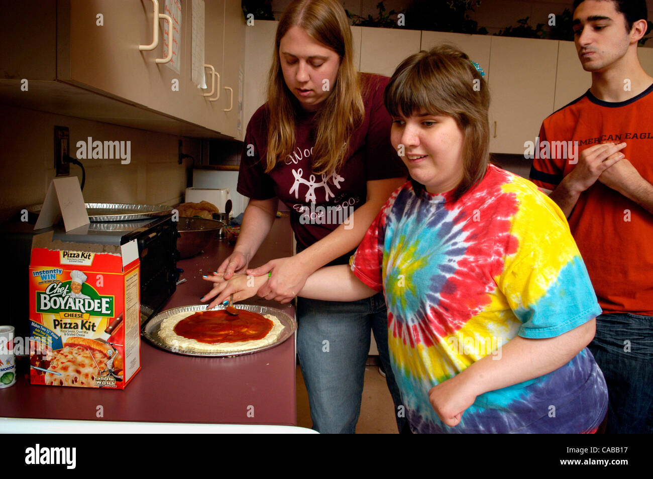 Jun 02, 2004; Woodstock, GA, USA; Special Ed teacher shows autistic ...