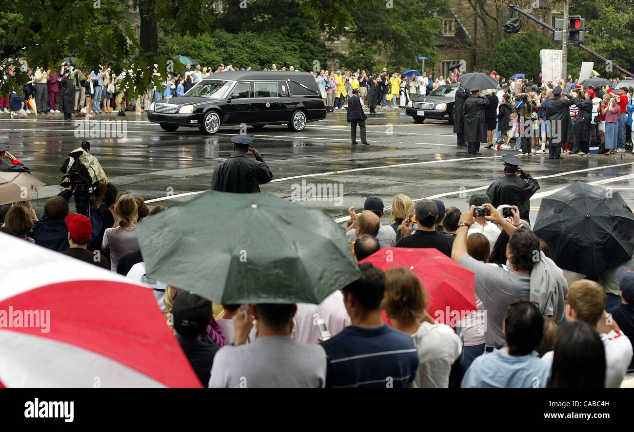 061104 WASHINGTON D.C. - People lining the sidewalks at Wisconson and ...