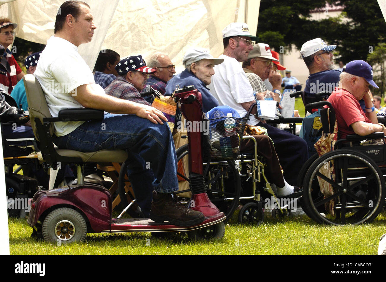 David Johnson who served in Viet Nam as a Marine, sits with other vets ...