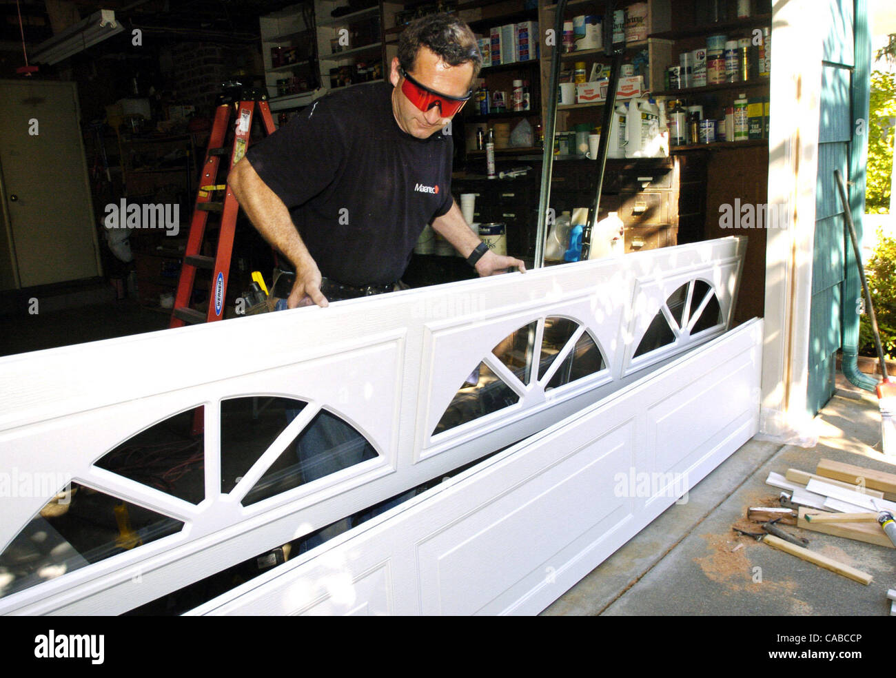 Greg Gillette owner of Alhambra Doors a small garage door company he ...