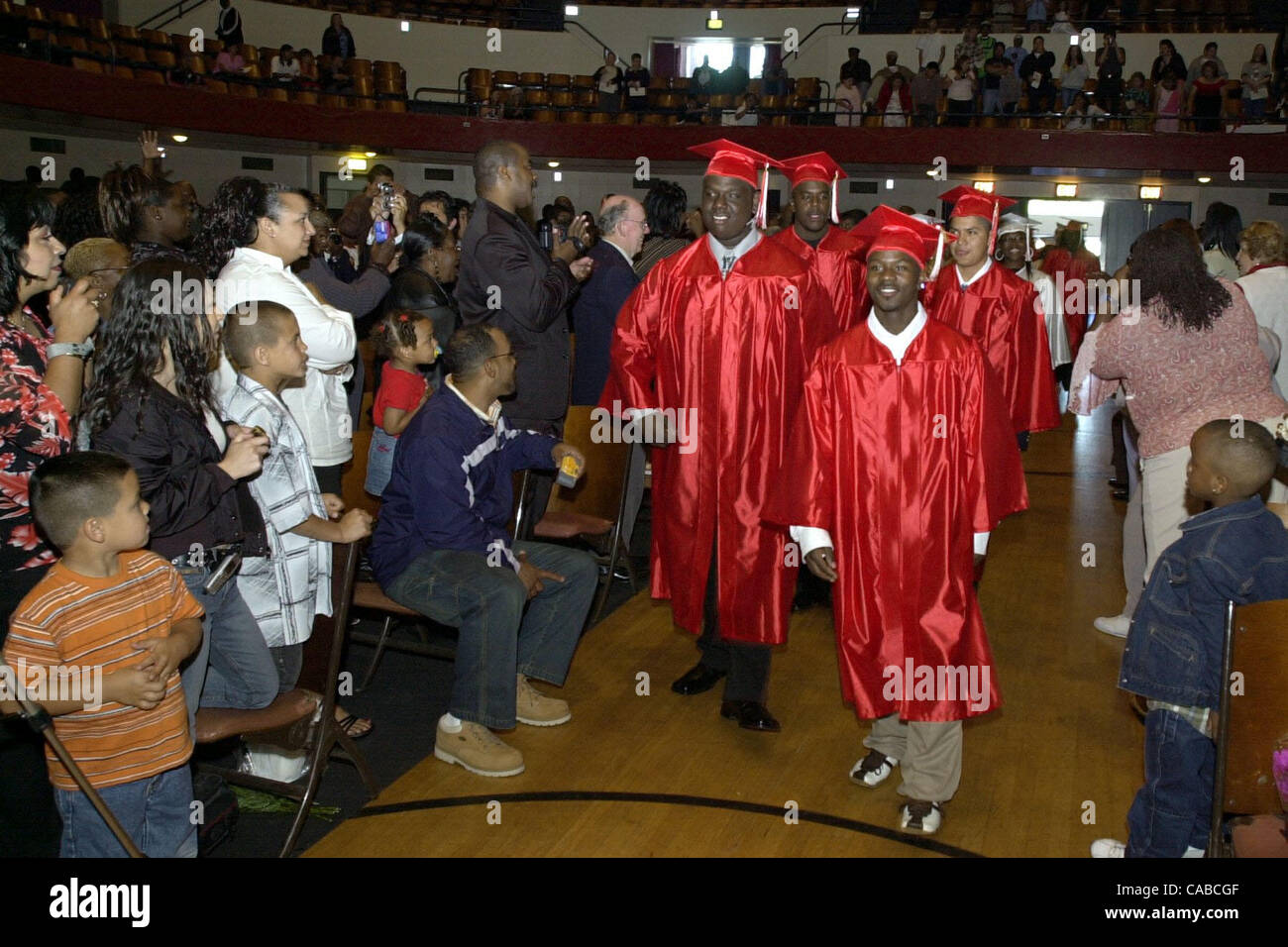 Kennedy High School graduates parade past family and friends during ...