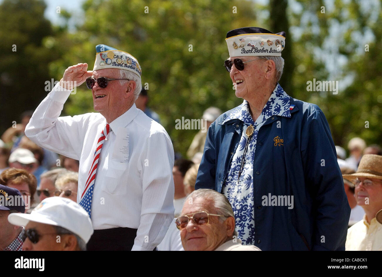 Pearl Harbor survivors Marvin Recknor, left, and James Hourigan stand ...