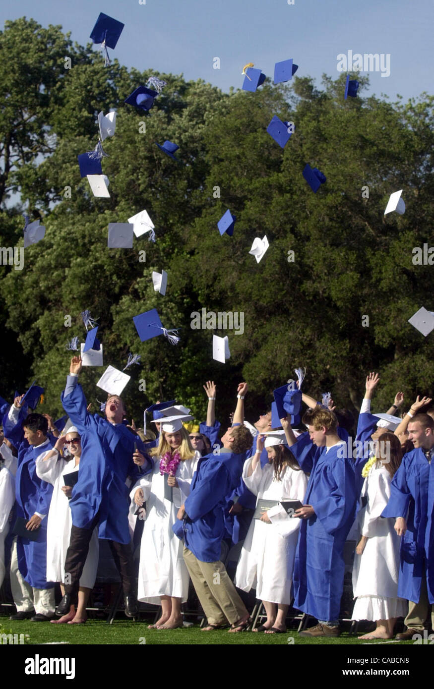 Acalanes High School graduates toss their caps after receiving their ...