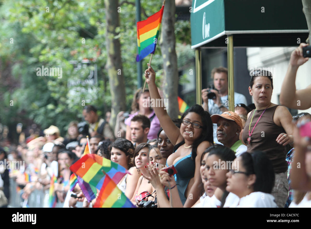 New Yorkers Celebrating The Gay Pride Parade Along Fifth Ave In