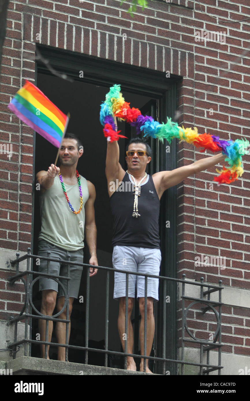 New Yorkers Celebrating The Gay Pride Parade Along Fifth Ave In