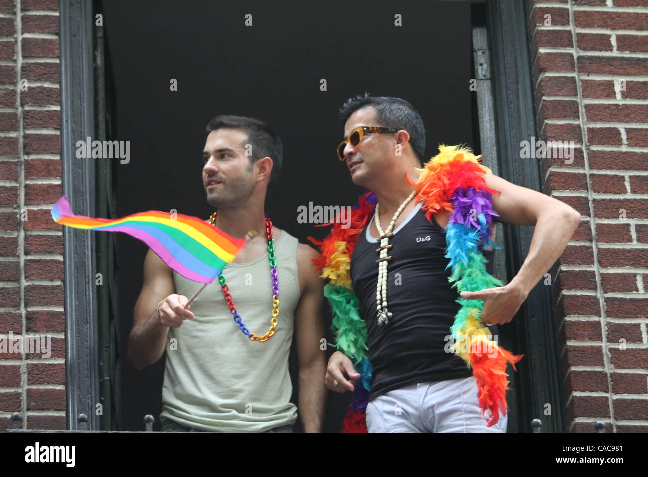 New Yorkers Celebrating The Gay Pride Parade Along Fifth Ave In