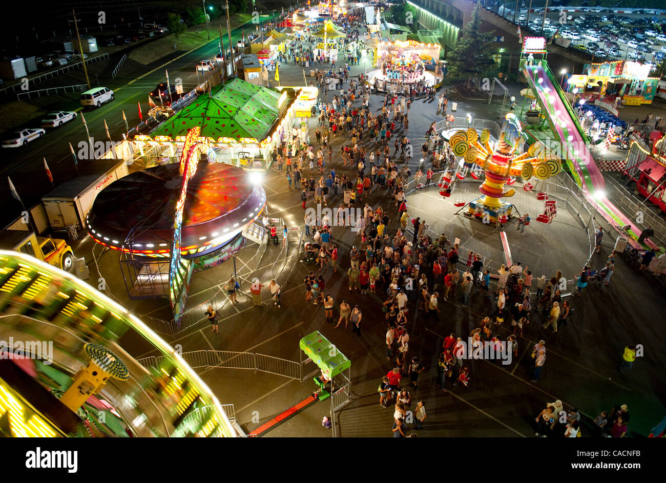 Aug. 06, 2010 - Roseburg, Oregon, U.S - People crowd the midway as ...
