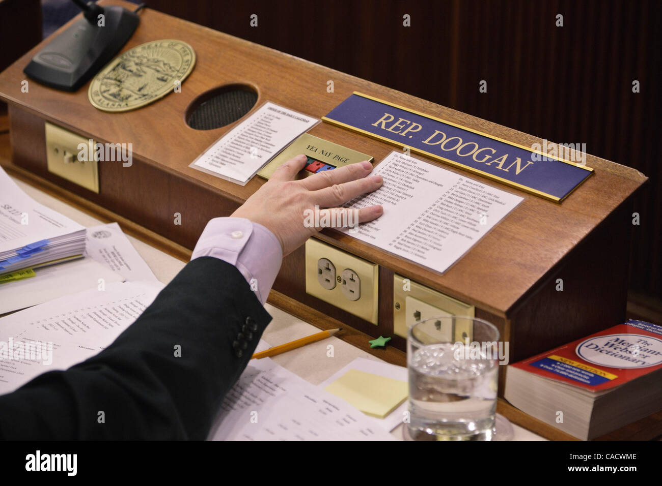 Rep. Mike Doogan votes in the Alaska State House of Representatives ...