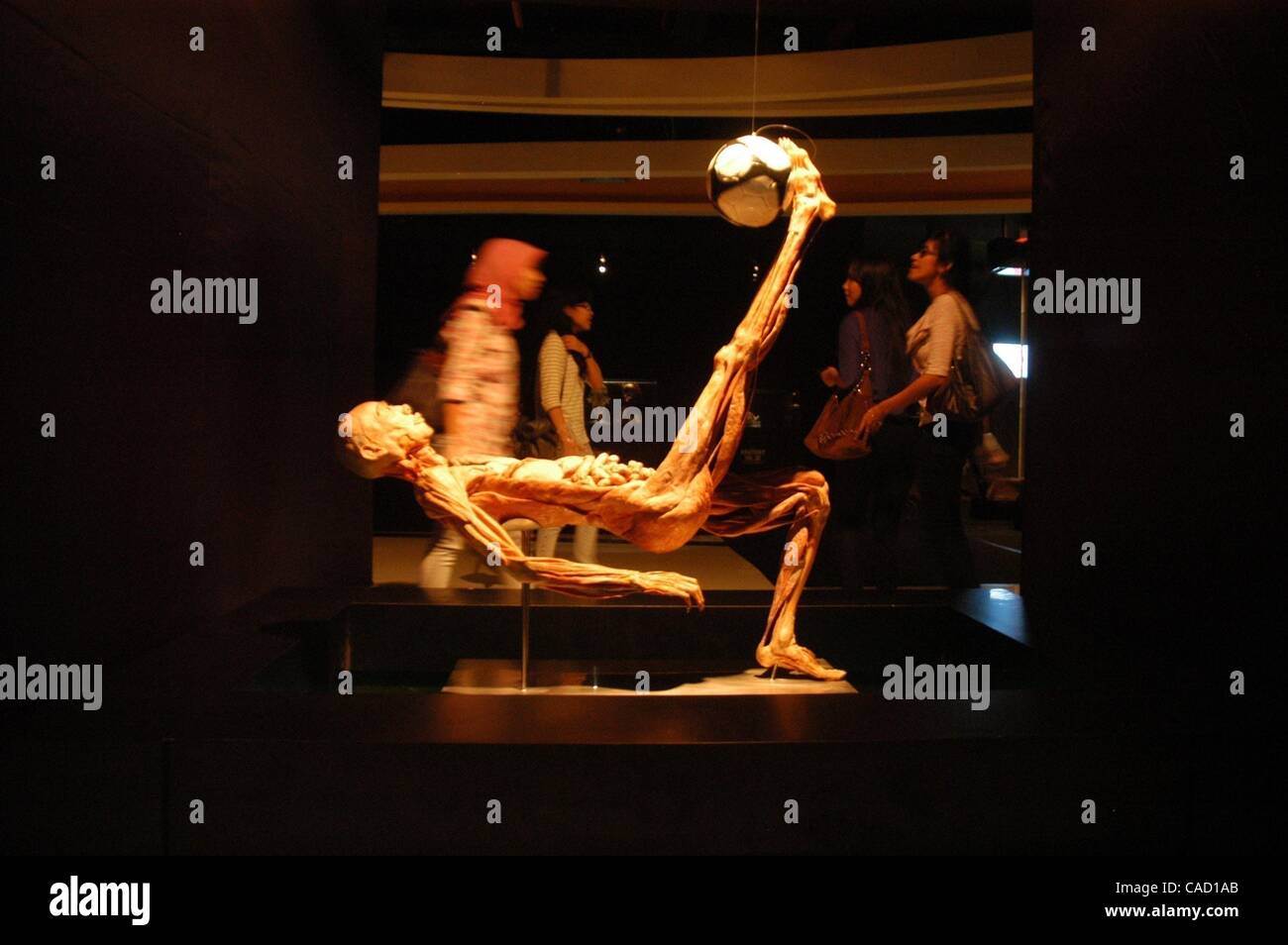 Jul 23, 2010 - Jakarta, Indonesia - A body part kicks a ball on display ...