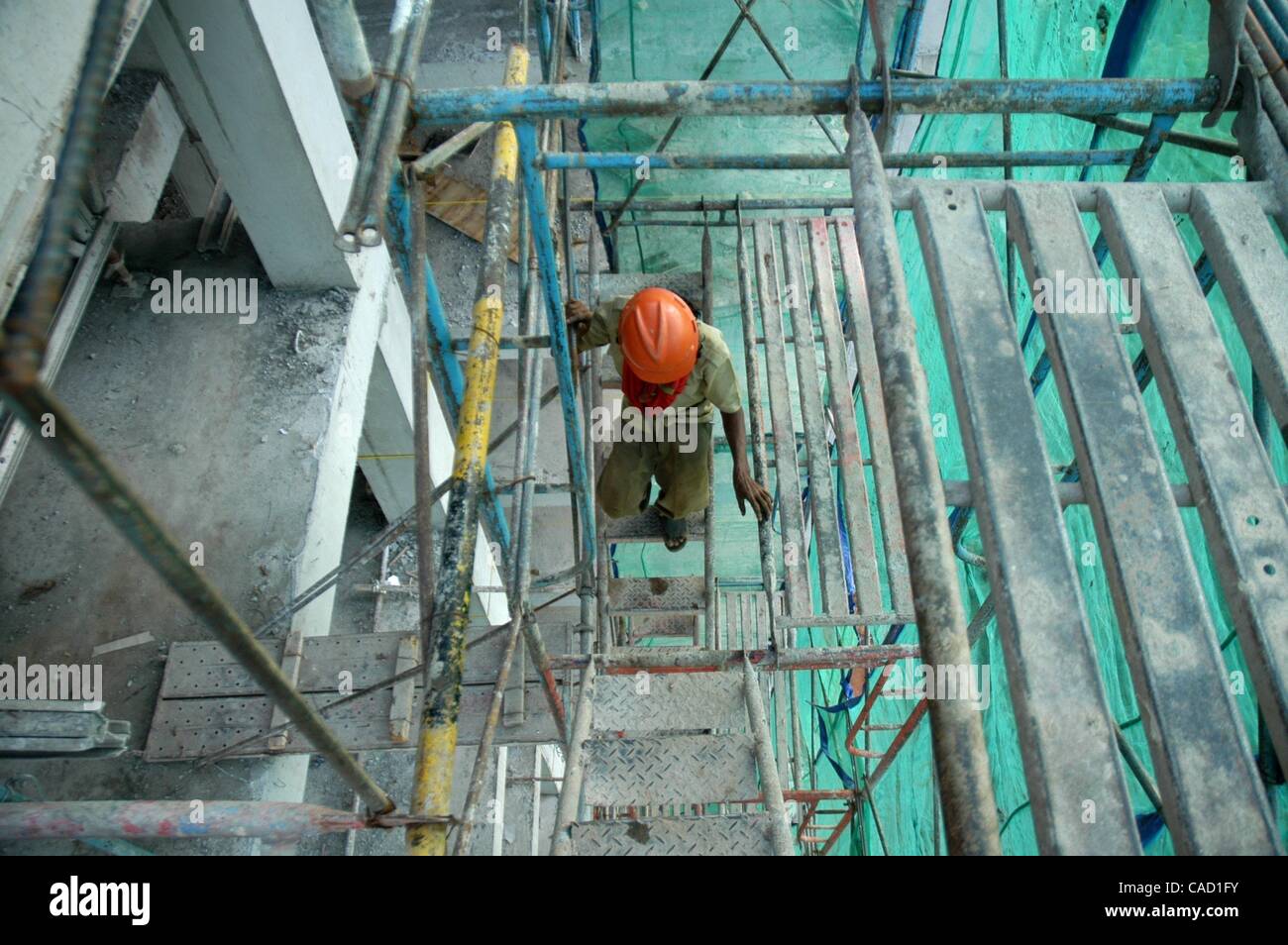 Jul 28, 2010 - Jakarta, Indonesia - Workers work in the apartment ...