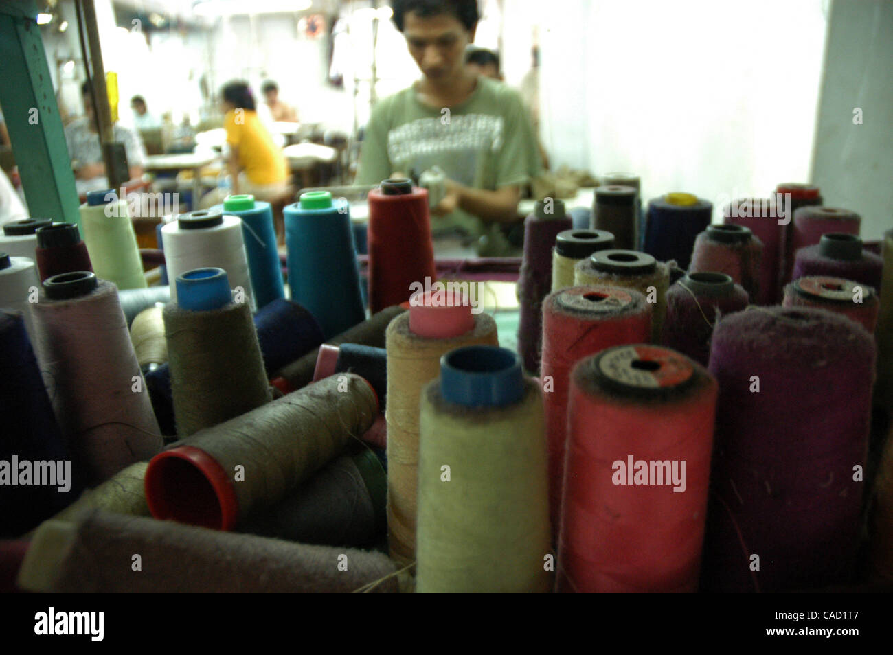 Workers sew clothes at Garment home industry factory in Jakarta ...
