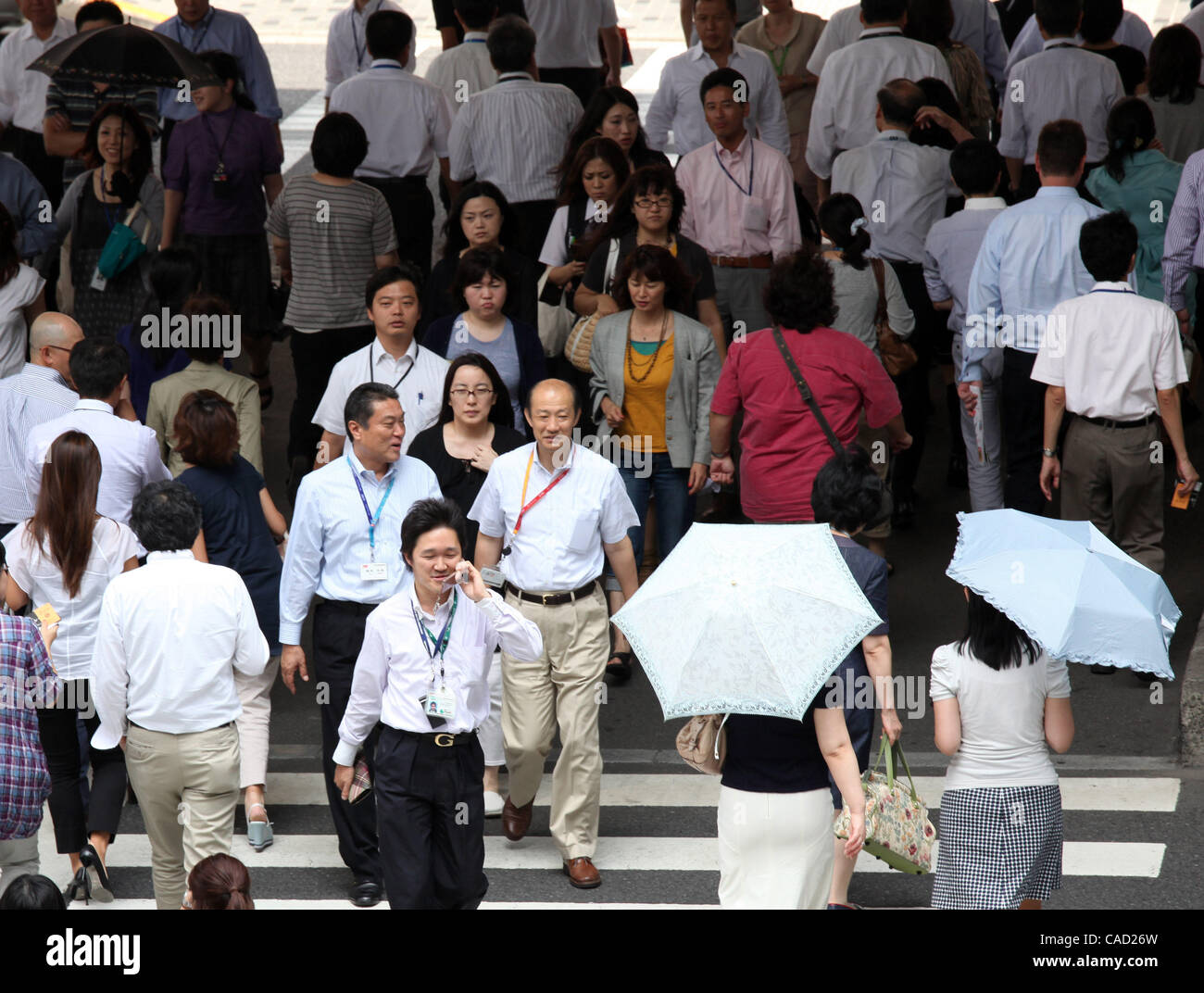 Aug 20, 2010 - Tokyo, Japan - Corporate employees walk on street in ...