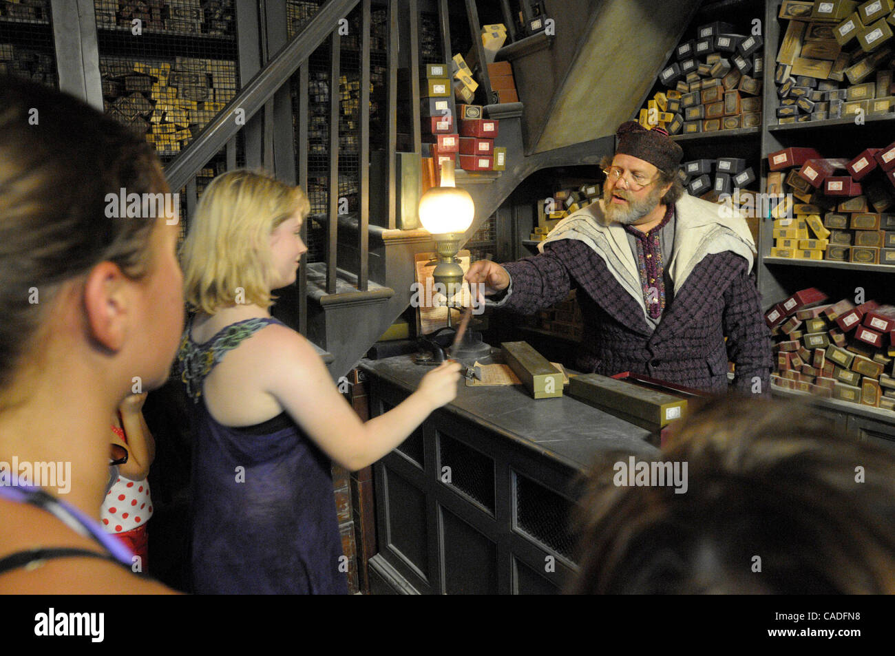 ALYSSA MIDDLETON, 14, center, of Granite Bay, California, waves a wand ...