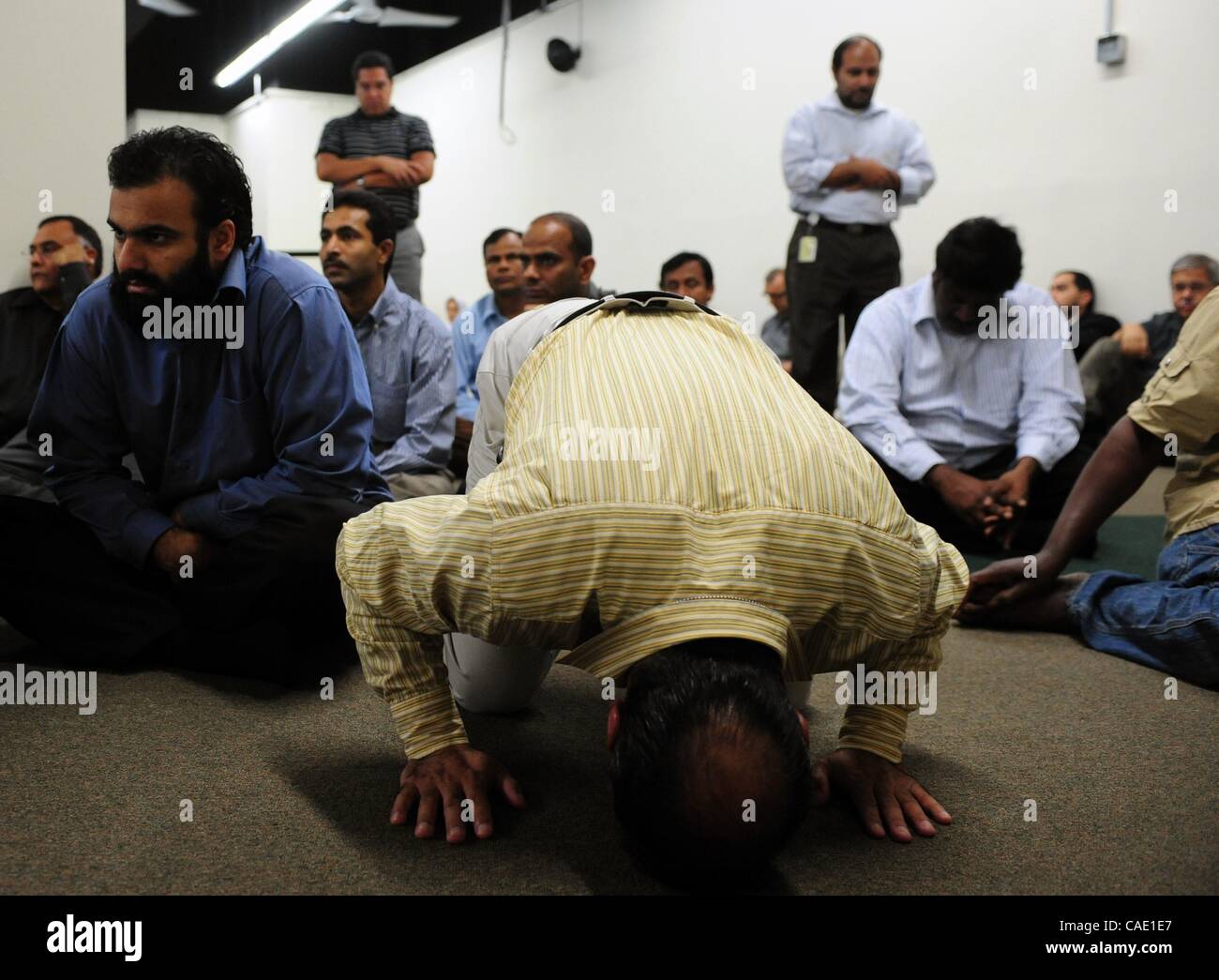 Aug. 20, 2010 - Manhattan, New York, U.S. - Imam Khalid Latif leads ...