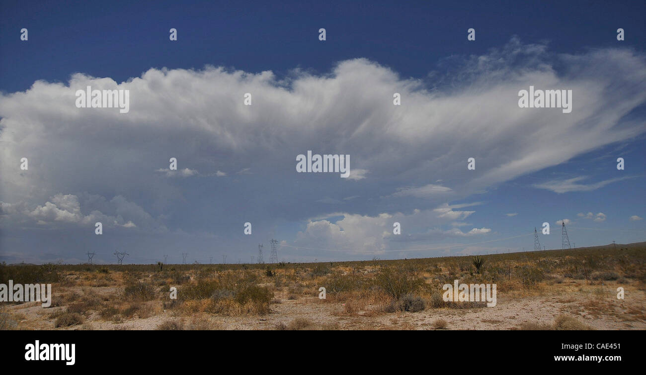 Aug 17-18 -Searchlight, Nevada, USA. Monsoon clouds cross over the town ...