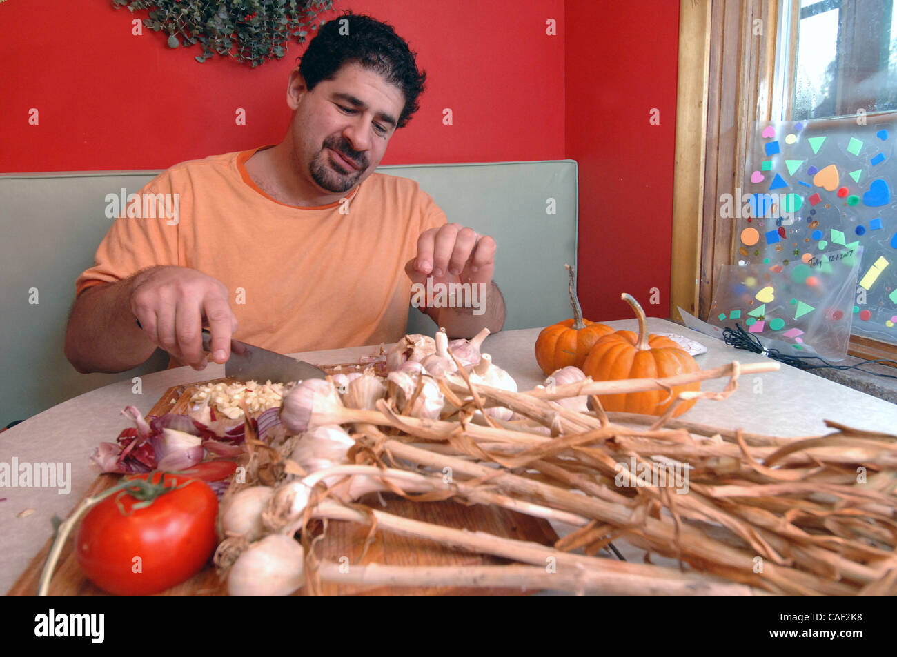 Dec. 12, 2007 - Ann Arbor, Mi, Michigan, U.S - Dan Marano chops up some ...