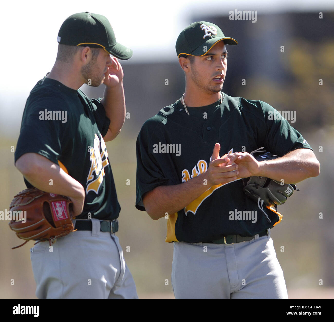 Oakland Athletics pitcher Gio Gonzalez, right, talks to shortstop Bobby ...
