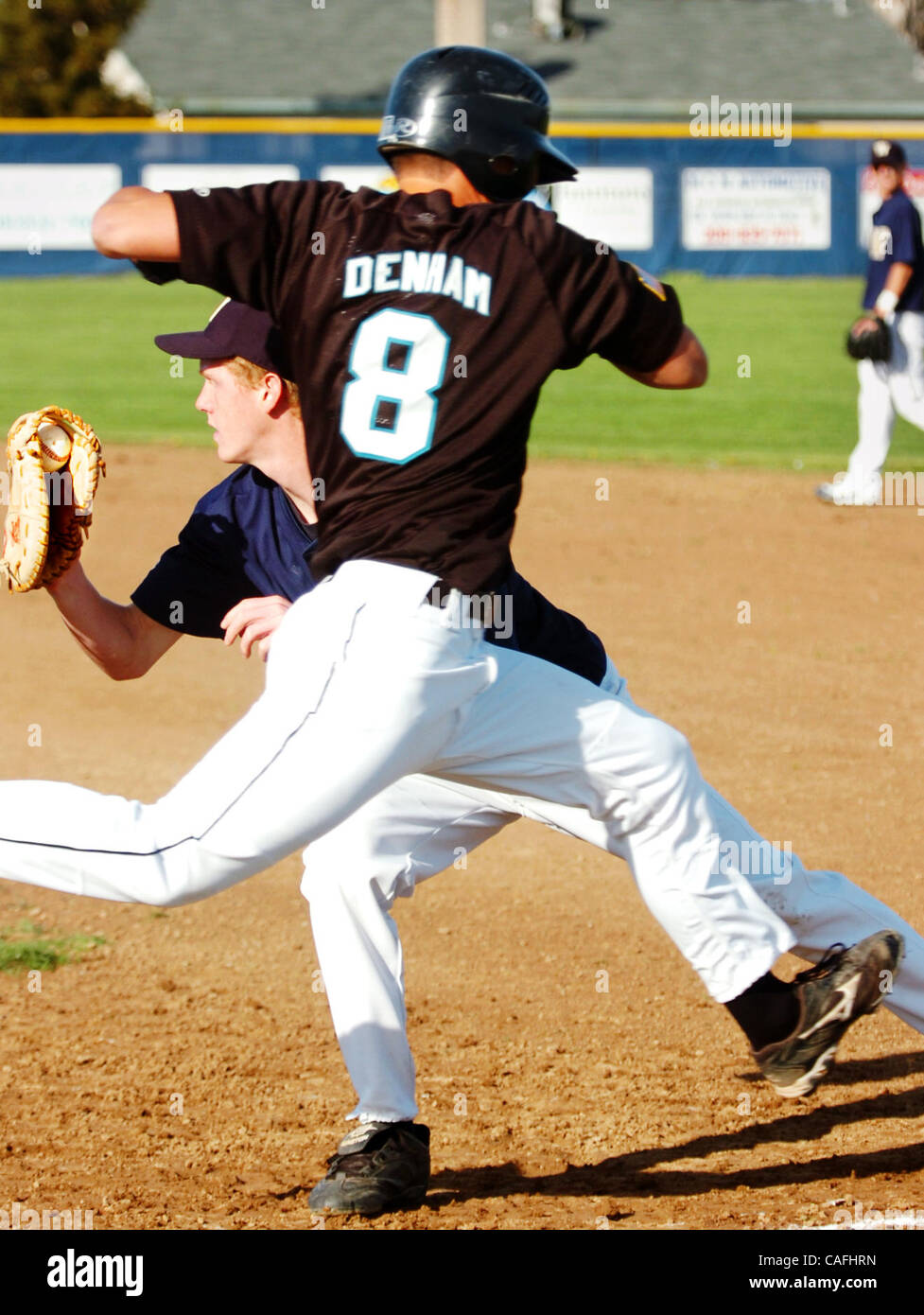 West High's Tyler Shepherd makes the put out after Deer Valley's #8 ...