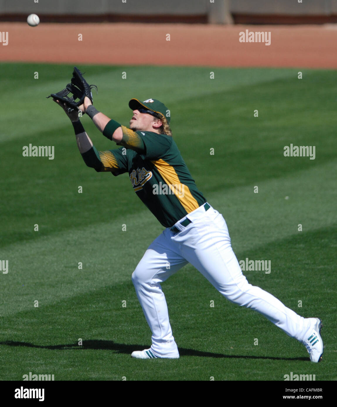 Oakland Athletics right fielder Travis Buck catches a routine pop-up ...