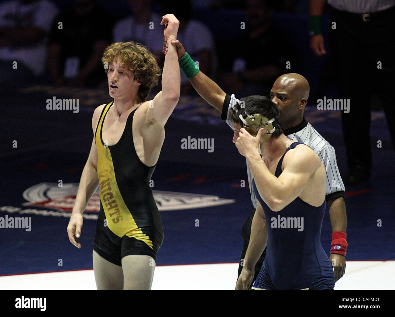 Las Lomas' Jason Welch (left) arm is raised after defeating Central ...