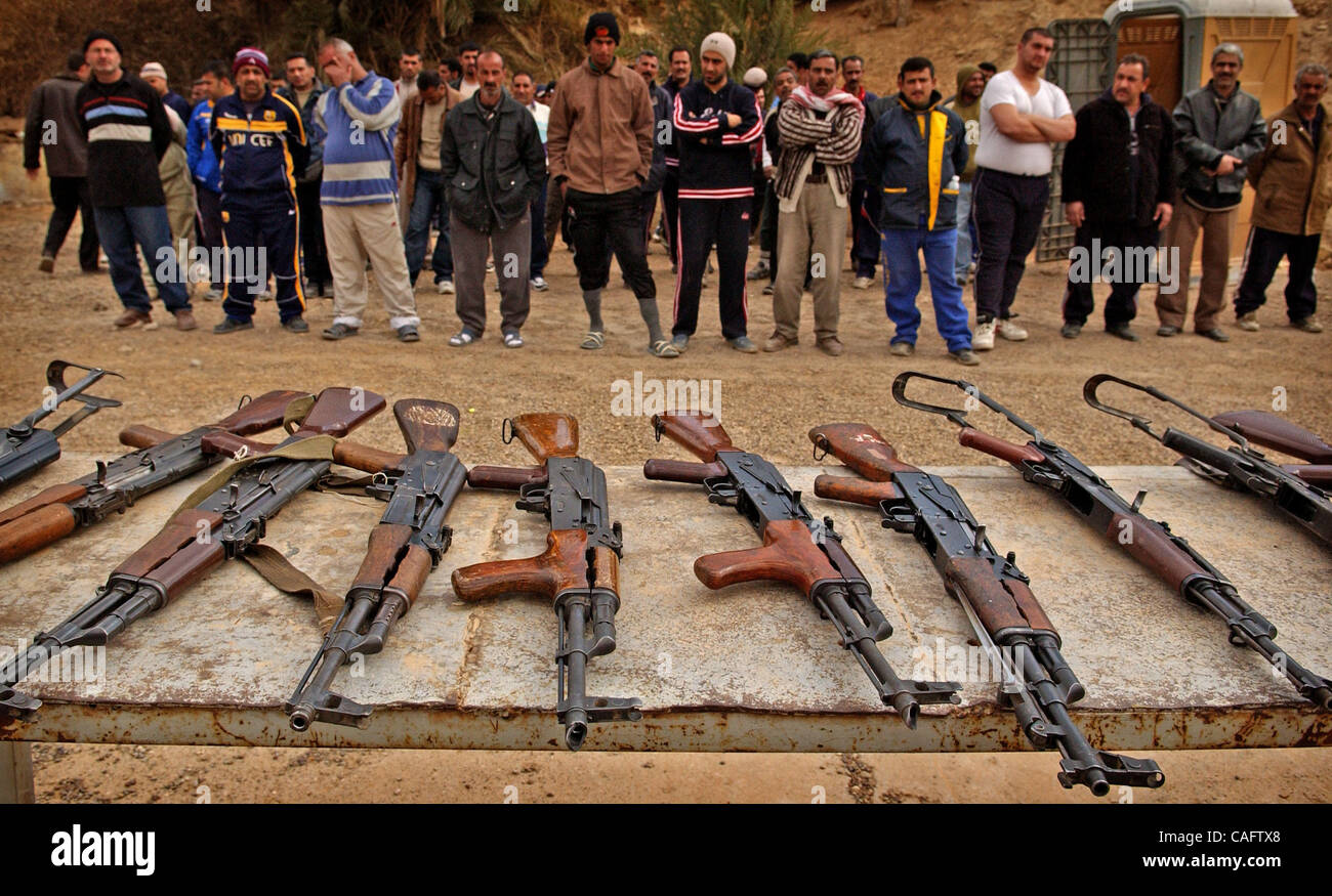 Feb 20, 2008 - Baghdad, Iraq - Sons of Iraq recruits stand back and ...