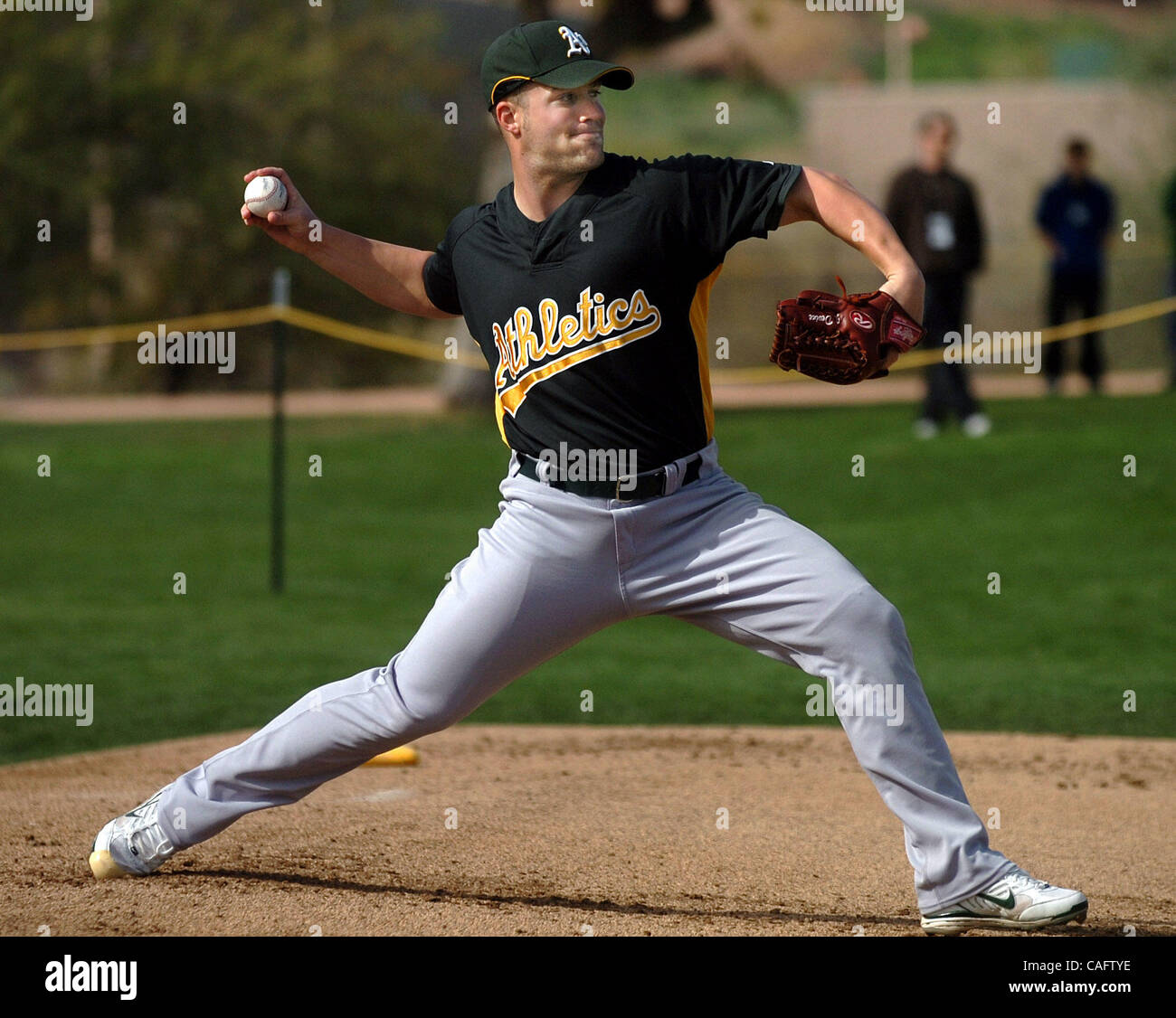 Joey Devine of the A's practices pitching during Spring Training at ...