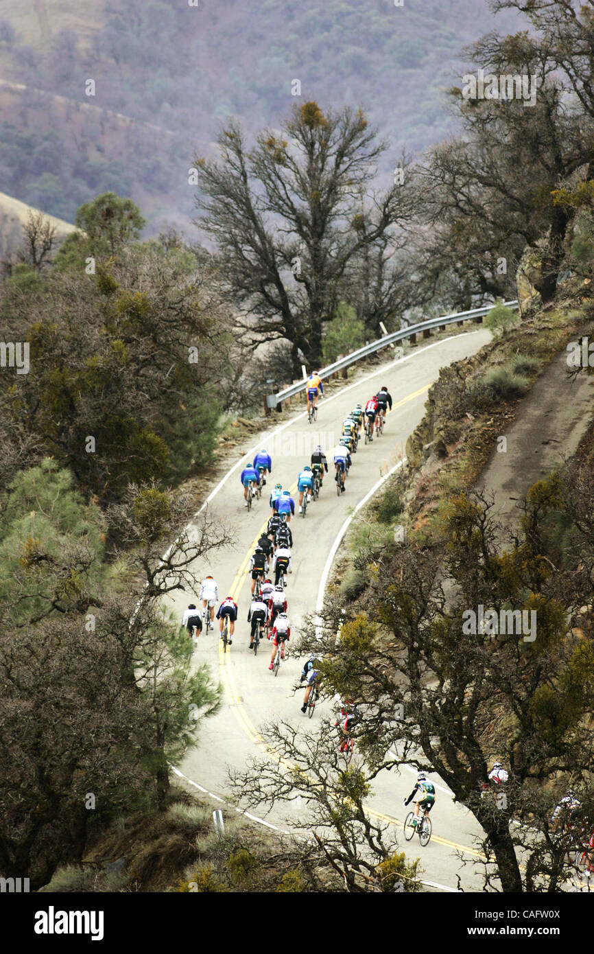 Racers take a curve on Mt. Hamilton Rd. as they compete along a course ...