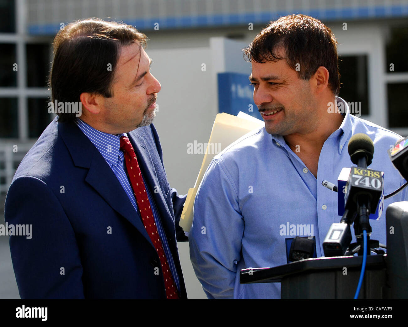 Supervisor John Gioia (left) speaks with Donaldo Argueta Rodriguez ...