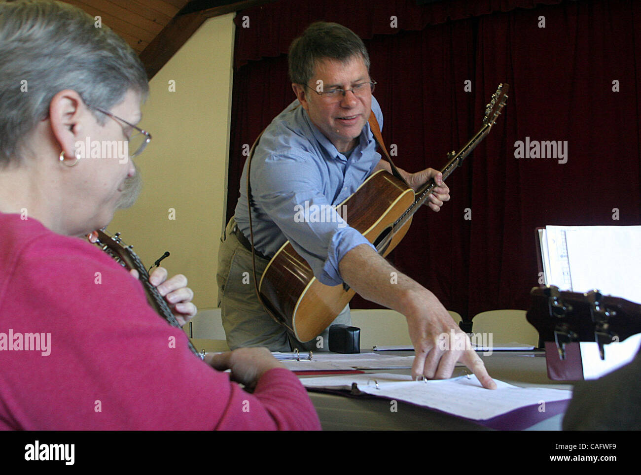 Rev. David Bringman (right) works with Colleen Vermillion during ...