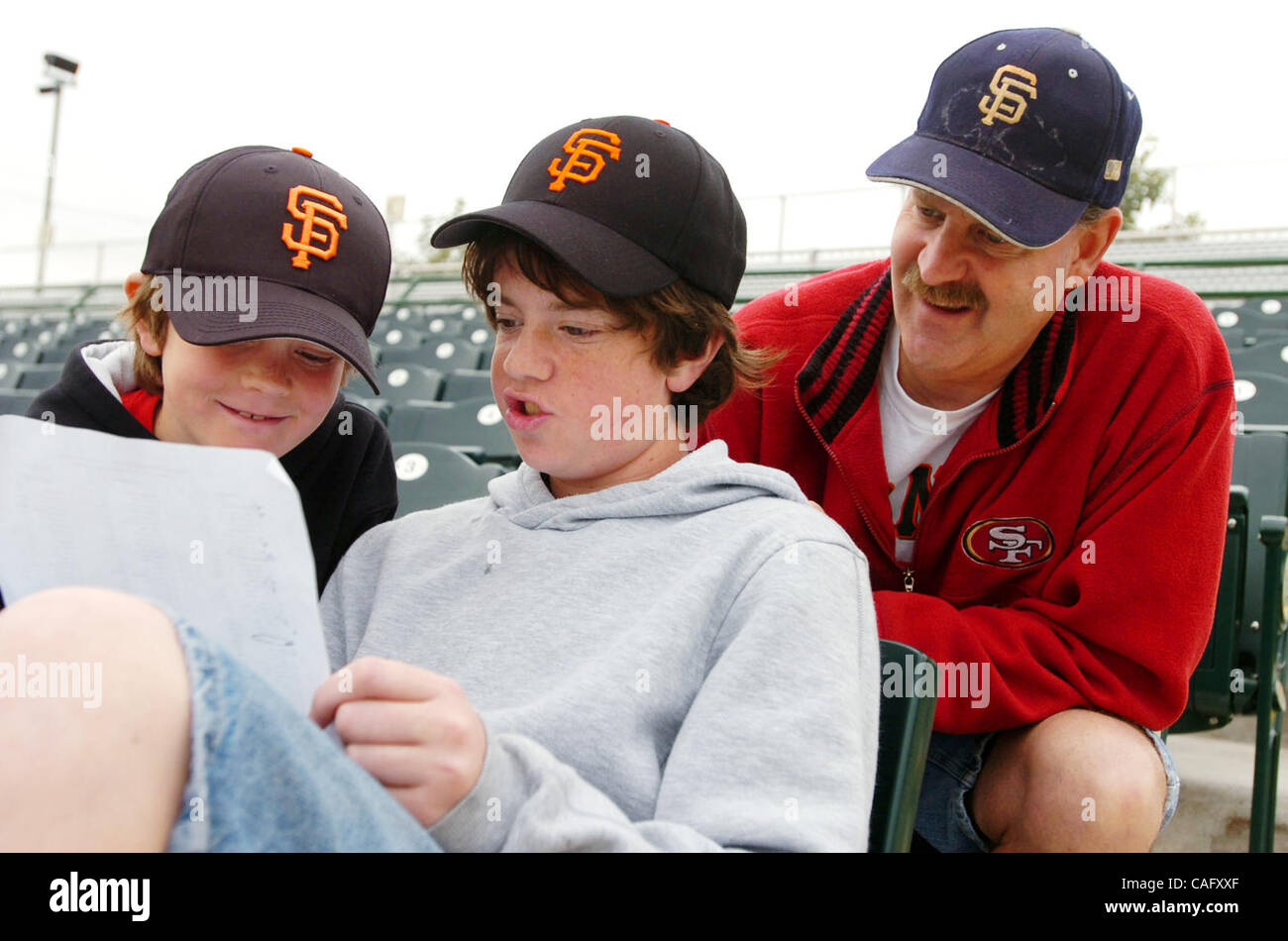 From left, Jonathan, Steven, and Don Parkman of San Jose, Calif. take a ...