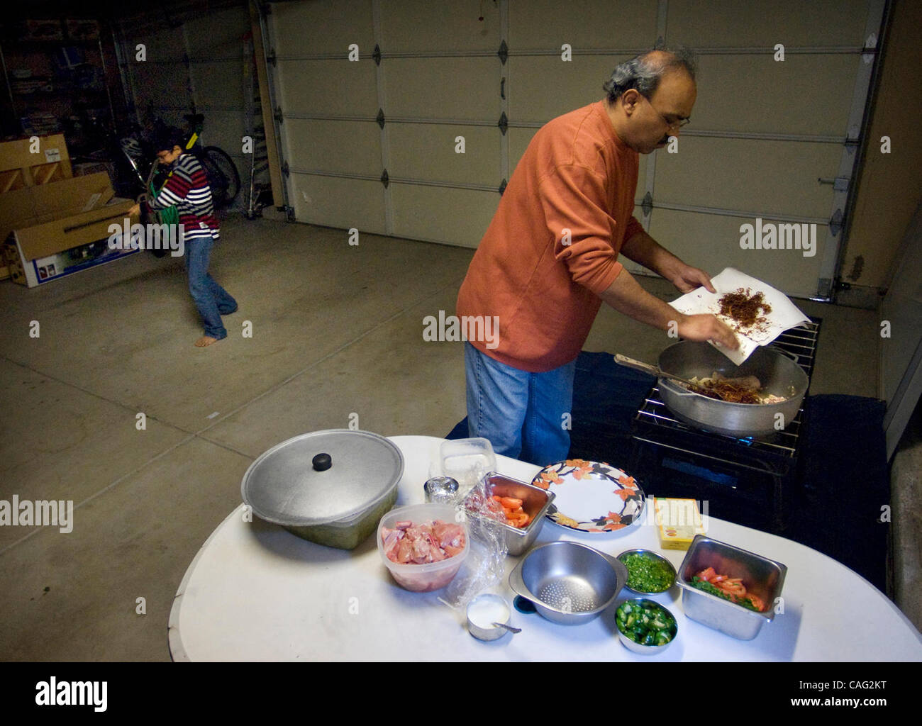 Feb 24, 2008 - Gold River, California, USA - SAMI SIDDIQUI adds fried ...