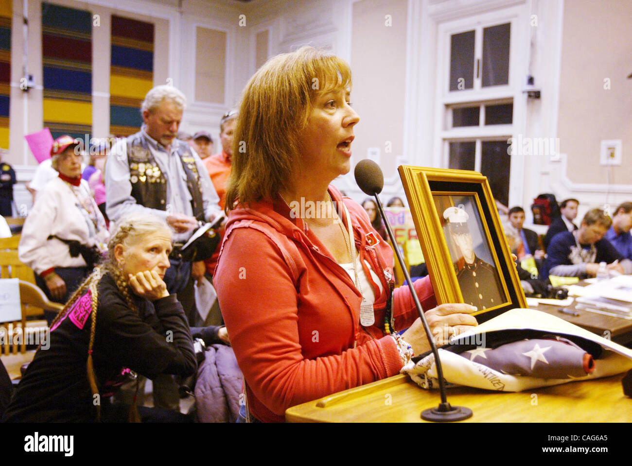 Deborah Johns of Roseville holds a portrait of her son Sgt. William ...