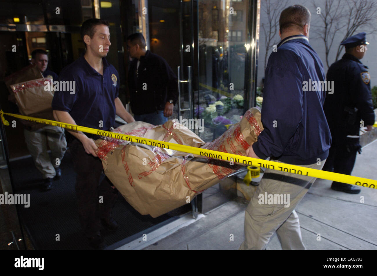 NYPD CSI officers remove evidence from the office building of KAthryn ...