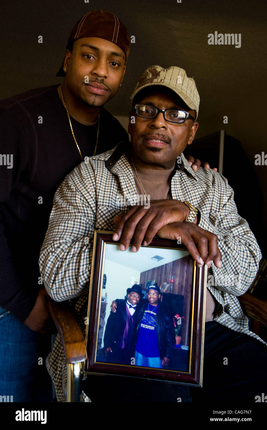 Joe Hunter Sr. photographed with his oldest son Joe Hunter holds a ...