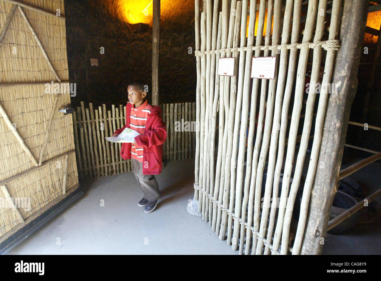 Daryl Bishop, 7, of Oakland tours the hut replica from East Africa's ...