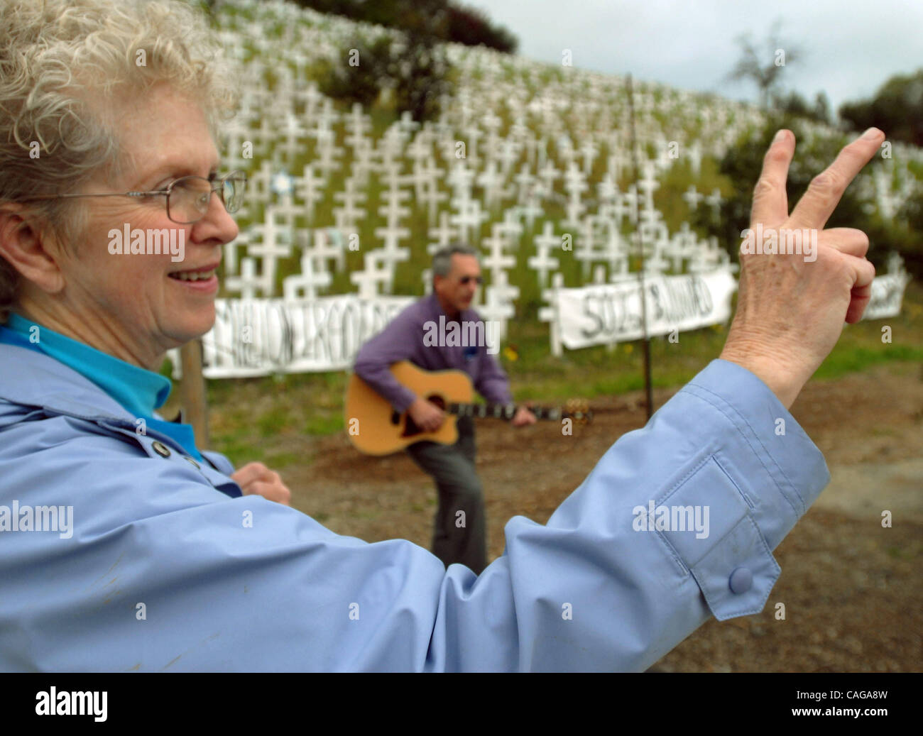 Pleasant Hill resident Patricia Derickson displays the peace sign for ...