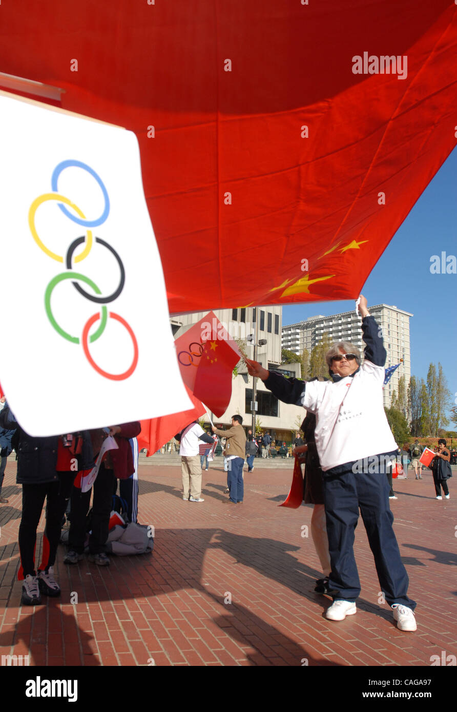 Yu Sun Long, San Jose, holds up a flag of the Republic of China with ...