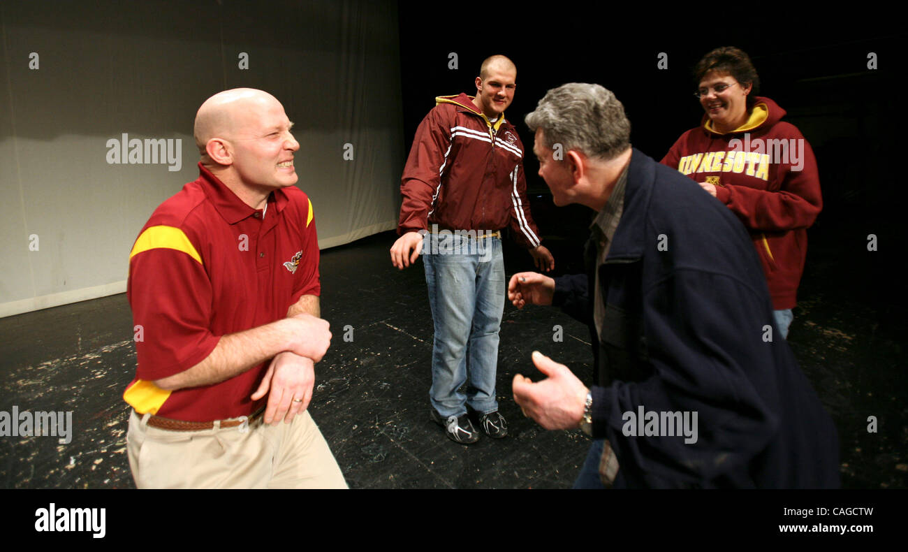 Champlin Park senior Sam Maresh stood back as his father Bill, left ...