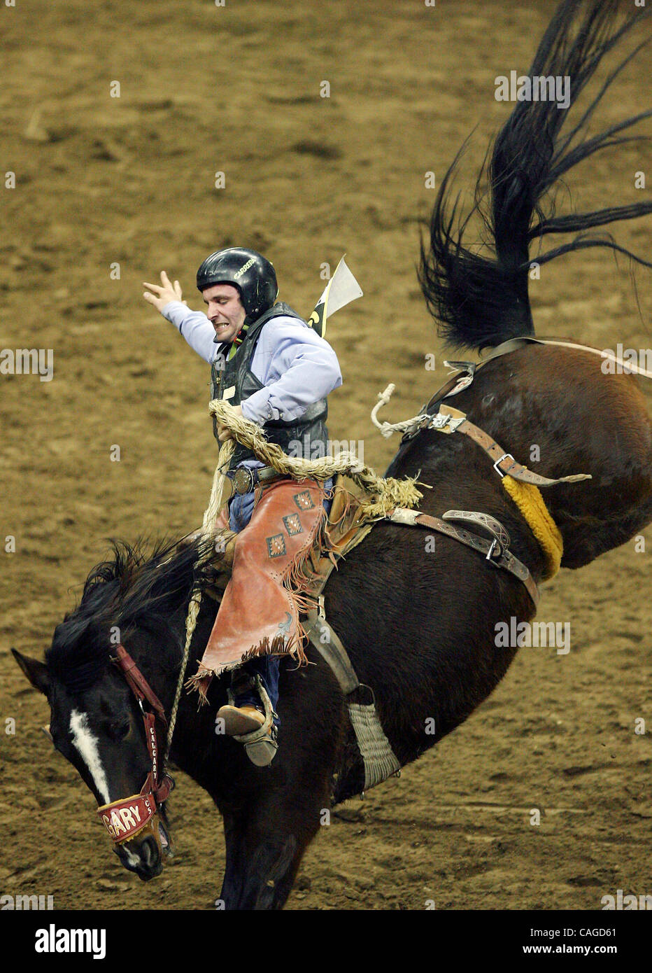 FOR METRO - Todd Herzog, from Penhold, AB, competes in the Saddle Bronc ...