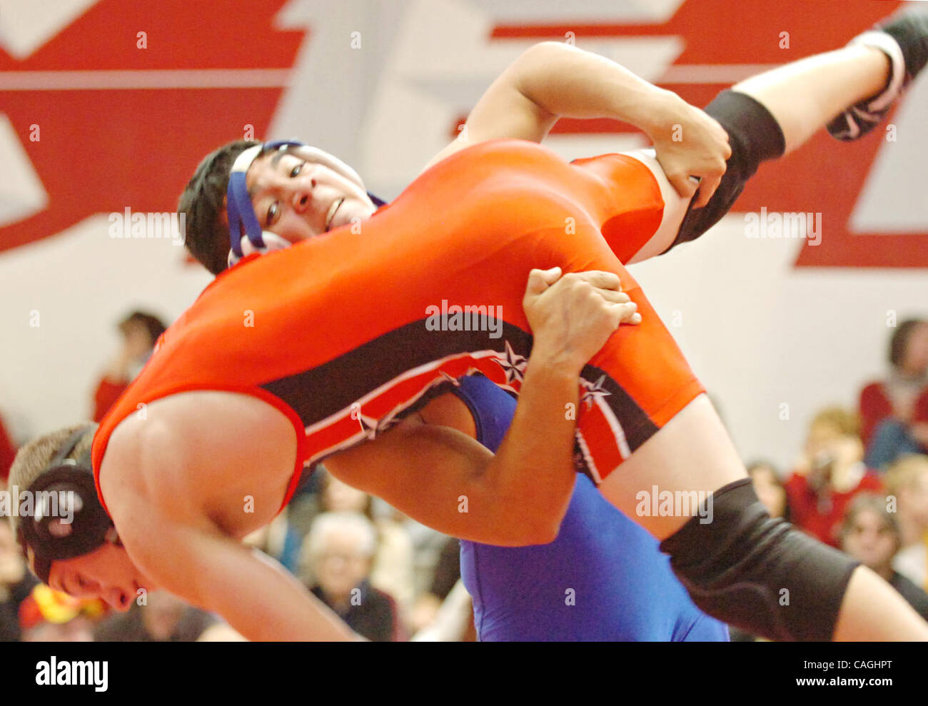 Sierra High wrestler Nico Valencia, standing, sends East Union's ...