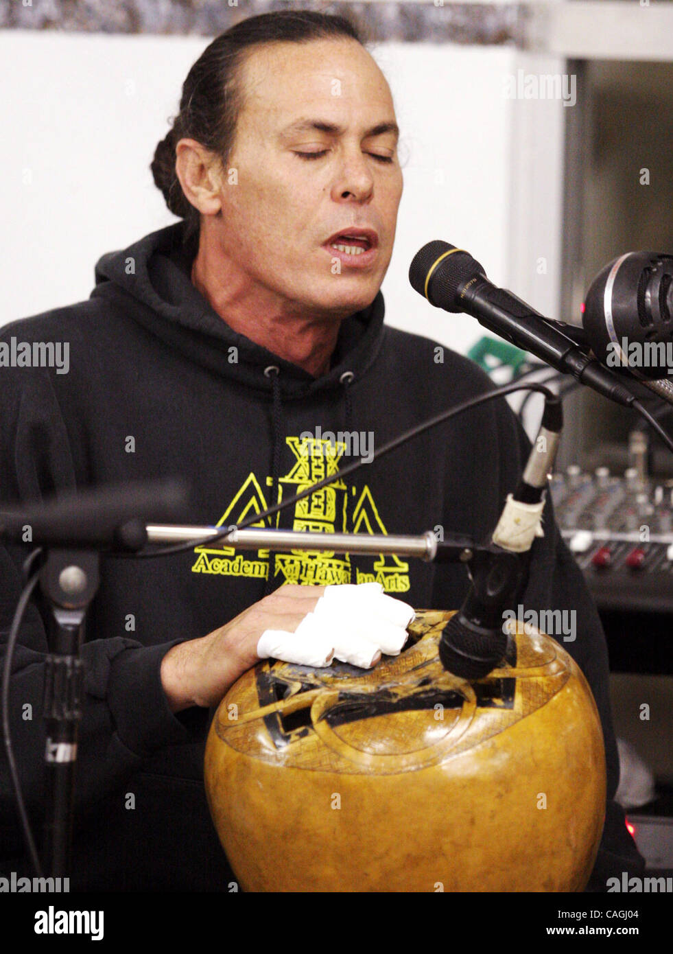 Voclalist Mark Ho-omalu, of Oakland, plays the Ipu Heke during the Hula ...