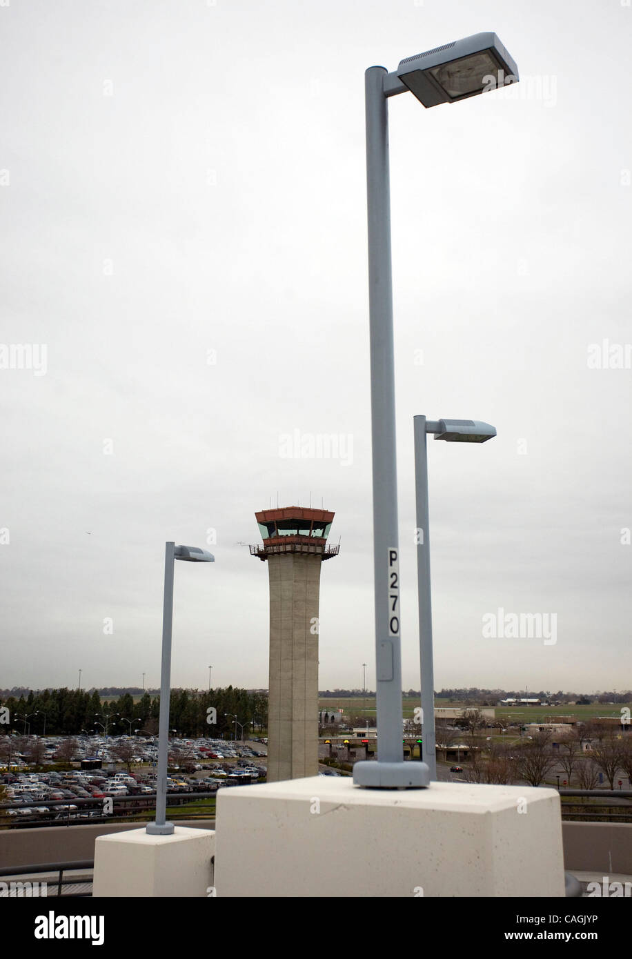 Light standards seem to dwarf the 150-foot tall control tower built in ...