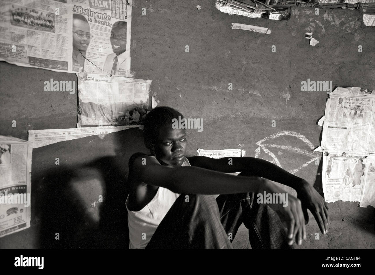 One of Moses' younger brothers in their family's hut. Moses' father ...