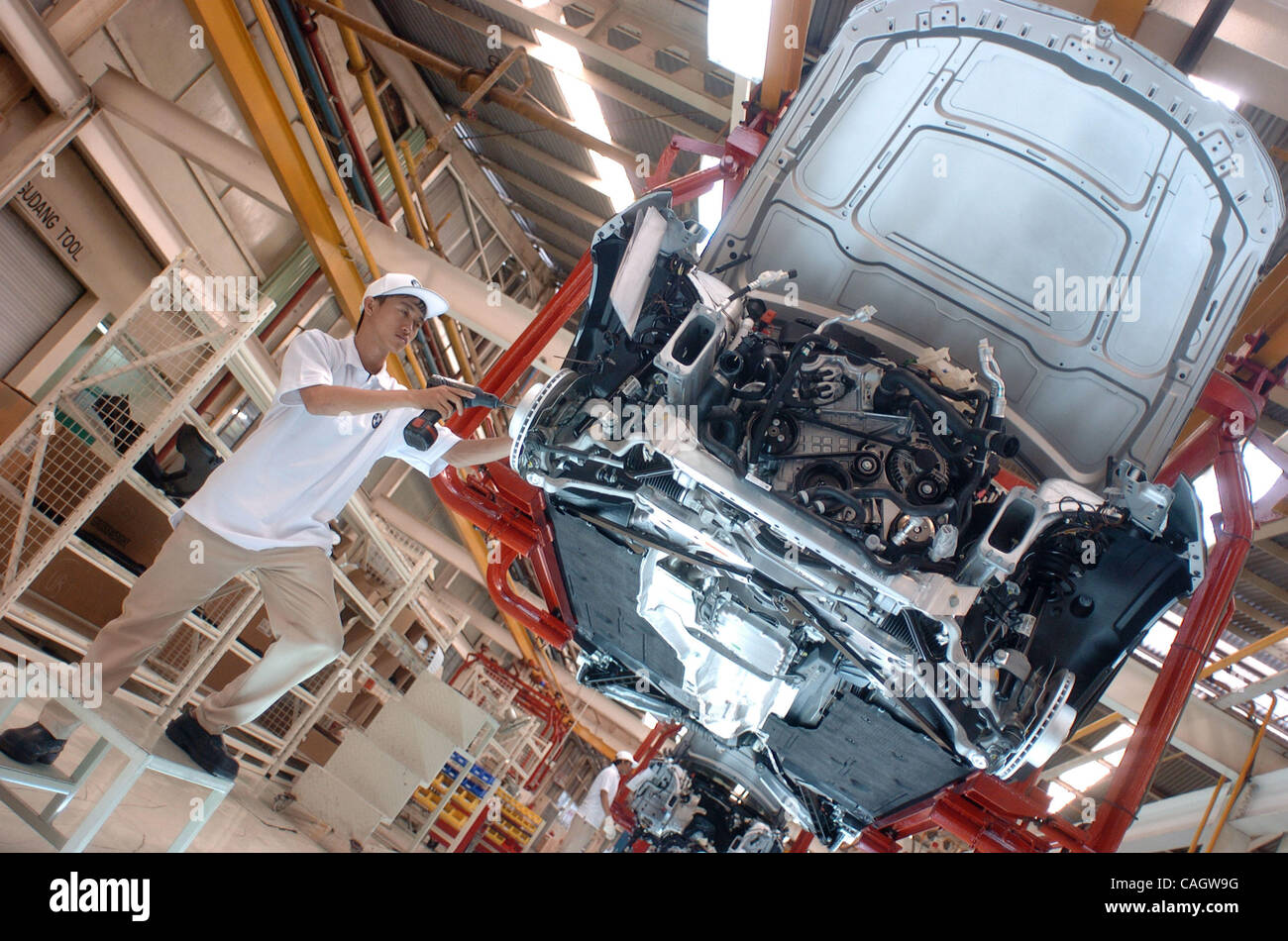 Worker works at BMW assembling factory in Jakarta, Indonesia. Tuesday ...