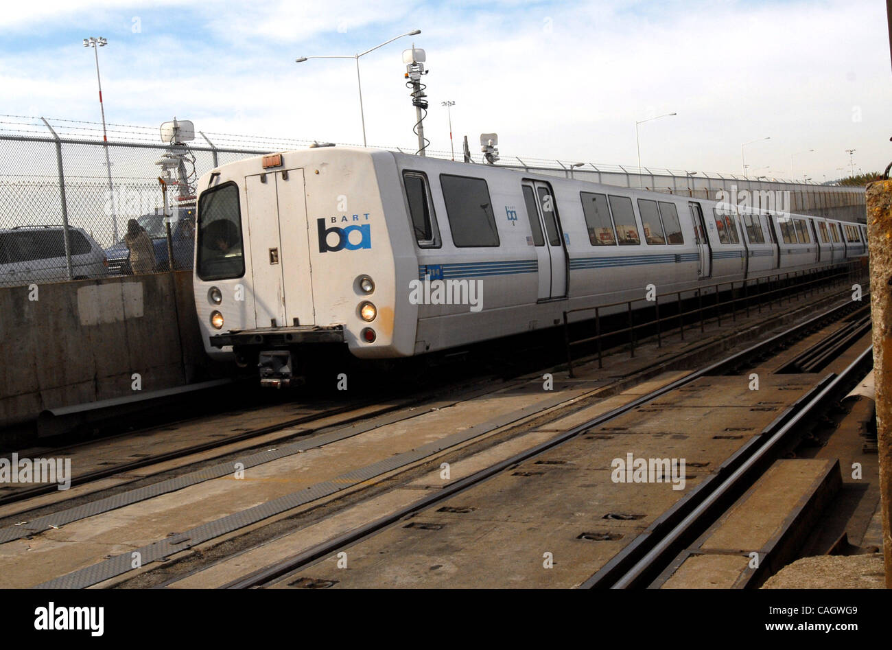 A east bound BART train comes out of the Transbay Tube Friday morning ...