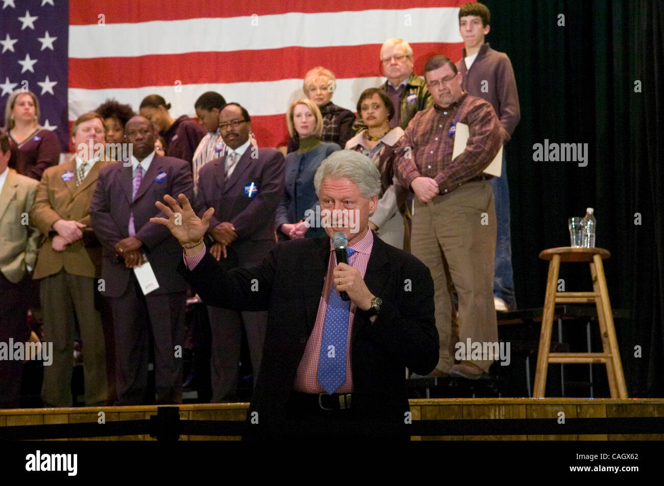 Former U.S. President Bill Clinton conducts a town hall meeting on ...