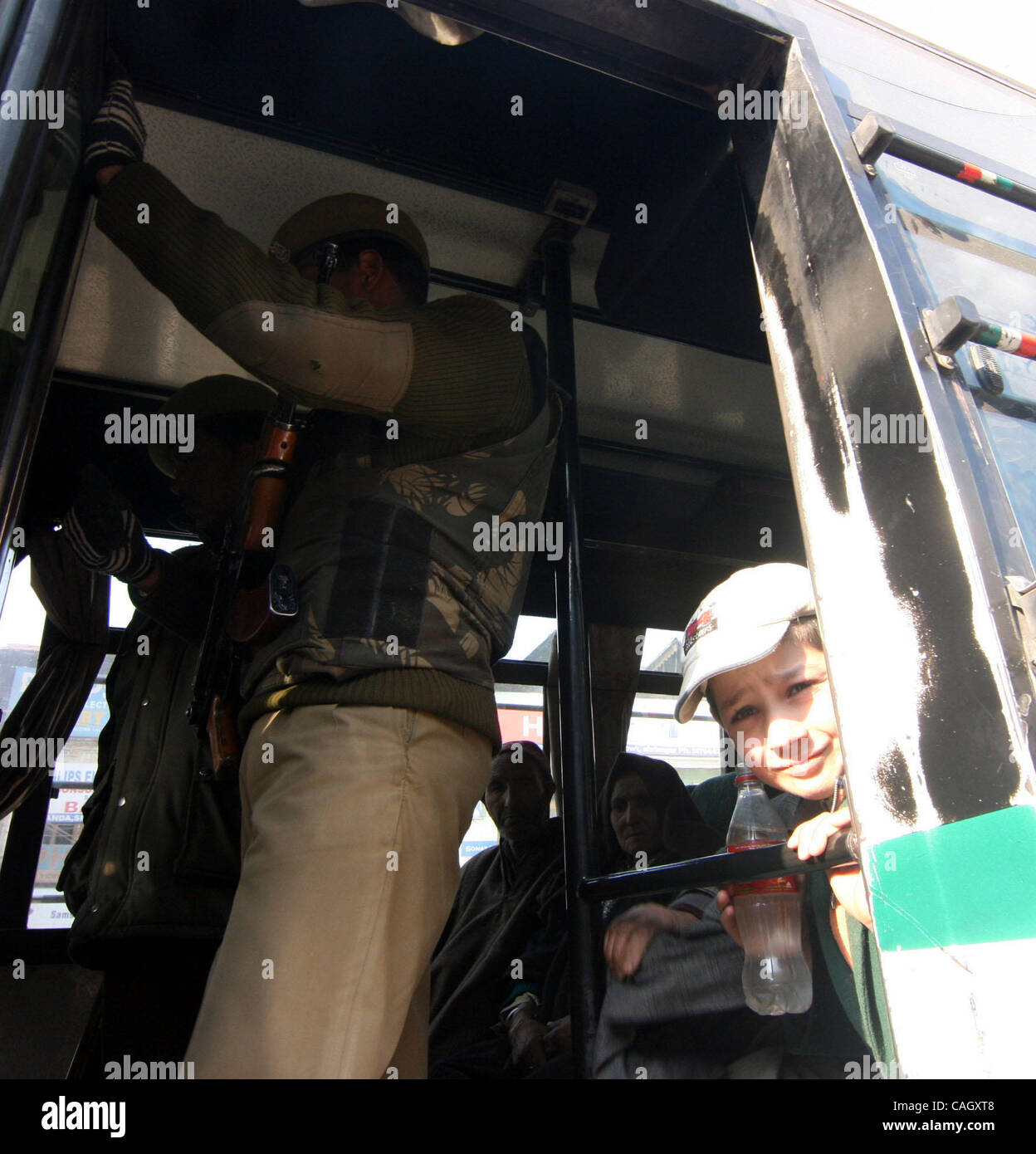 Views of security arrangments as people being checked,passenger ...