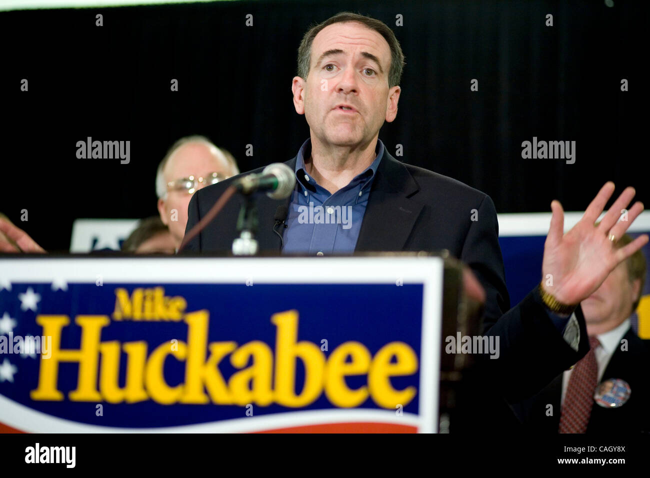 Republican Presidential hopeful Mike Huckabee addresses the media at ...